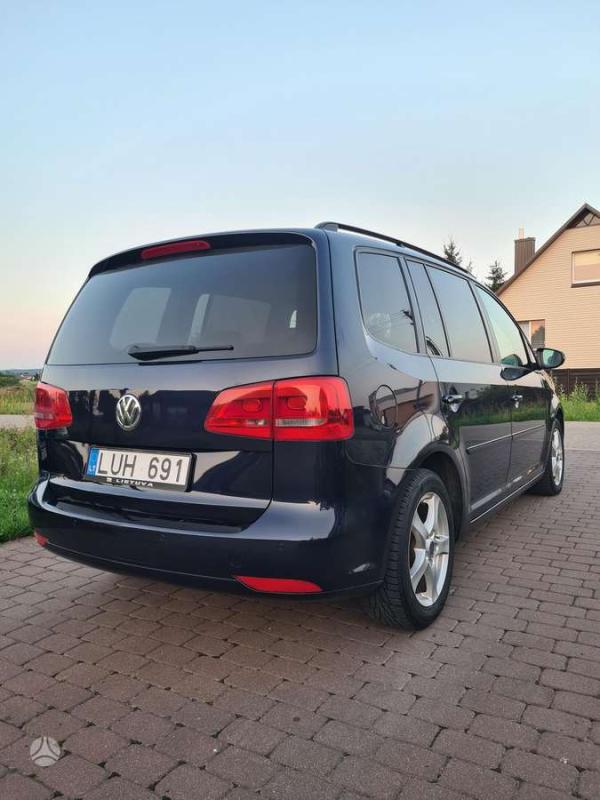 Blue Volkswagen Touran 2011 in Kaisiadorys, with an engine capacity of 1.97 L and mileage of 256 thousand km for 5350 €, photo 4 on AUTOMOTO.COM.LV