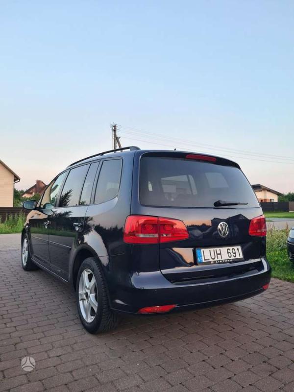 Blue Volkswagen Touran 2011 in Kaisiadorys, with an engine capacity of 1.97 L and mileage of 256 thousand km for 5350 €, photo 5 on AUTOMOTO.COM.LV