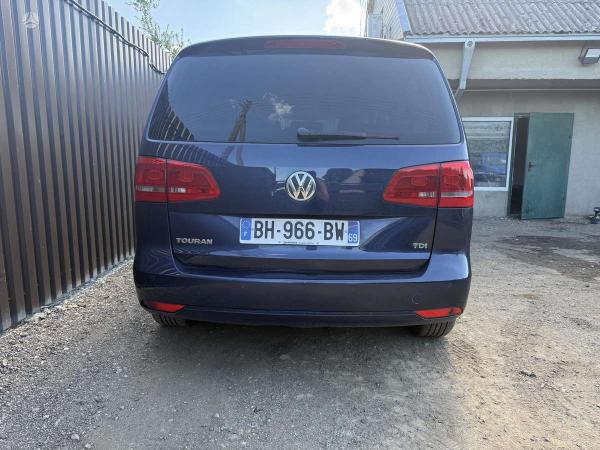Zils Volkswagen Touran 2011 Kauņa, ar dzinēja tilpumu 1.60 L un nobraukumu 208 tūkst. km par 3100 €, foto 4 vietnē AUTOMOTO.COM.LV