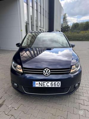 Blue Volkswagen Touran 2011 in Vilnius, with an engine capacity of 1.97 L and mileage of 261 thousand km for 6700 €, photo 4 on AUTOMOTO.COM.LV