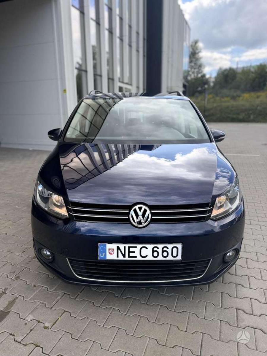 Blue Volkswagen Touran 2011 in Vilnius, with an engine capacity of 1.97 L and mileage of 261 thousand km for 6700 €, photo 4 on AUTOMOTO.COM.LV