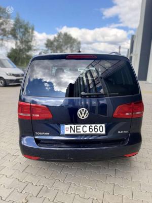 Blue Volkswagen Touran 2011 in Vilnius, with an engine capacity of 1.97 L and mileage of 261 thousand km for 6700 €, photo 5 on AUTOMOTO.COM.LV