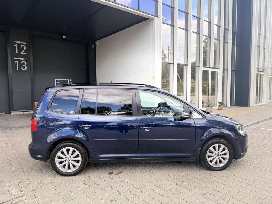 Blue Volkswagen Touran 2011 in Vilnius, with an engine capacity of 1.97 L and mileage of 261 thousand km for 6700 €, photo 9 on AUTOMOTO.COM.LV