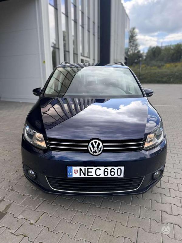 Blue Volkswagen Touran 2011 in Vilnius, with an engine capacity of 1.97 L and mileage of 261 thousand km for 6700 €, photo 4 on AUTOMOTO.COM.LV