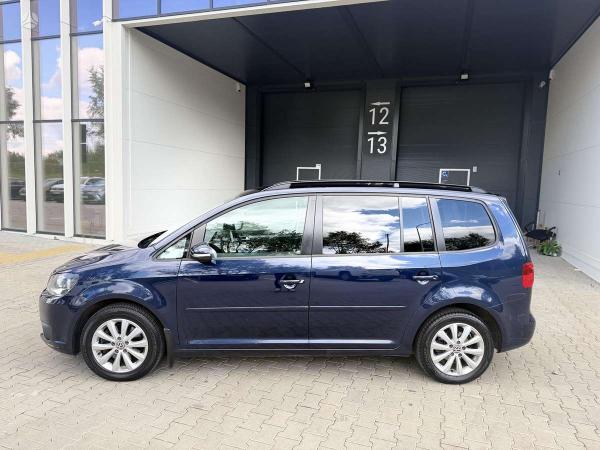 Blue Volkswagen Touran 2011 in Vilnius, with an engine capacity of 1.97 L and mileage of 261 thousand km for 6700 €, photo 8 on AUTOMOTO.COM.LV