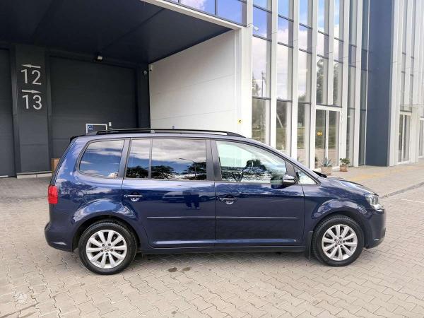 Blue Volkswagen Touran 2011 in Vilnius, with an engine capacity of 1.97 L and mileage of 261 thousand km for 6700 €, photo 9 on AUTOMOTO.COM.LV