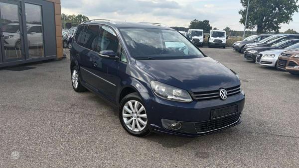 Blue Volkswagen Touran 2011 in Marijampole, with an engine capacity of 1.97 L and mileage of 187 thousand km for 5899 €, photo 1 on AUTOMOTO.COM.LV