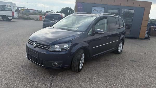 Blue Volkswagen Touran 2011 in Marijampole, with an engine capacity of 1.97 L and mileage of 187 thousand km for 5899 €, photo 7 on AUTOMOTO.COM.LV