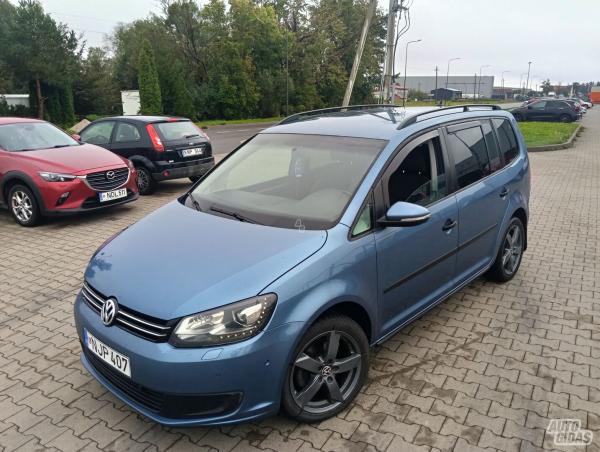 Blue Volkswagen Touran 2011 in Kaunas, with an engine capacity of 1.60 L and mileage of 333 thousand km for 4300 €, photo 1 on AUTOMOTO.COM.LV
