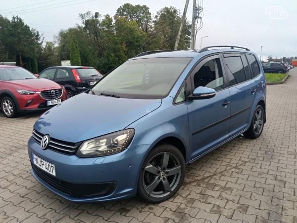 Blue Volkswagen Touran 2011 in Kaunas, with an engine capacity of 1.60 L and mileage of 333 thousand km for 4300 €, photo 3 on AUTOMOTO.COM.LV