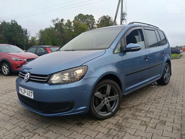 Blue Volkswagen Touran 2011 in Kaunas, with an engine capacity of 1.60 L and mileage of 333 thousand km for 4300 €, photo 4 on AUTOMOTO.COM.LV