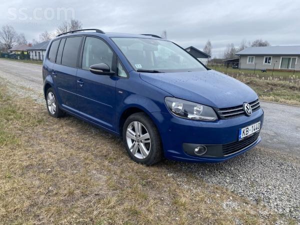 Blue Volkswagen Touran 2012 in Riga, with an engine capacity of 1.60 L and mileage of 0 thousand km for 4399 €, photo 2 on AUTOMOTO.COM.LV