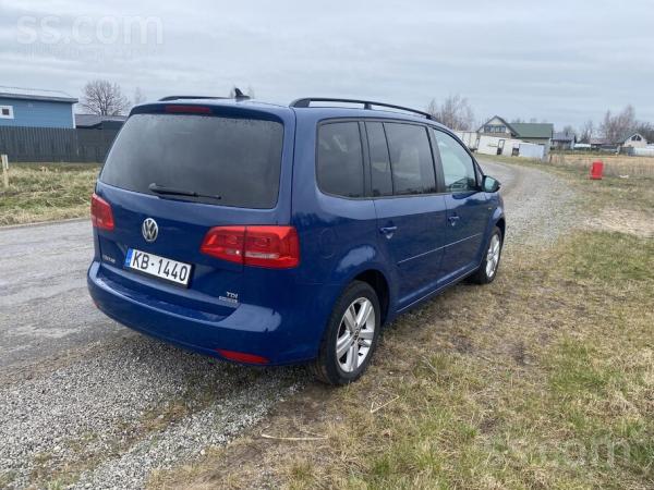 Blue Volkswagen Touran 2012 in Riga, with an engine capacity of 1.60 L and mileage of 0 thousand km for 4399 €, photo 3 on AUTOMOTO.COM.LV