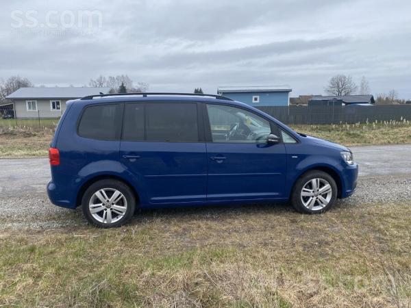 Blue Volkswagen Touran 2012 in Riga, with an engine capacity of 1.60 L and mileage of 0 thousand km for 4399 €, photo 5 on AUTOMOTO.COM.LV