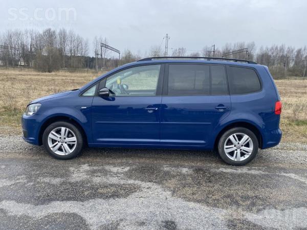Blue Volkswagen Touran 2012 in Riga, with an engine capacity of 1.60 L and mileage of 0 thousand km for 4399 €, photo 6 on AUTOMOTO.COM.LV