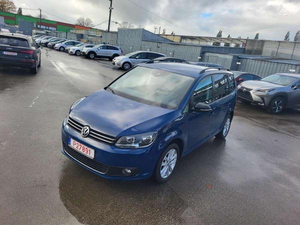 Blue Volkswagen Touran 2012 in Klaipeda, with an engine capacity of 1.97 L and mileage of 263 thousand km for 6600 €, photo 7 on AUTOMOTO.COM.LV