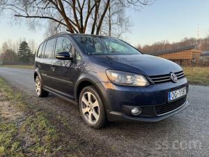 Blue Volkswagen Touran 2012 in Riga, with an engine capacity of 1.40 L and mileage of 328 thousand km for 7200 €, photo 2 on AUTOMOTO.COM.LV
