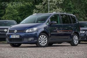 Blue Volkswagen Touran 2012 in Riga, with an engine capacity of 1.40 L and mileage of 227 thousand km for 7990 €, photo  on AUTOMOTO.COM.LV