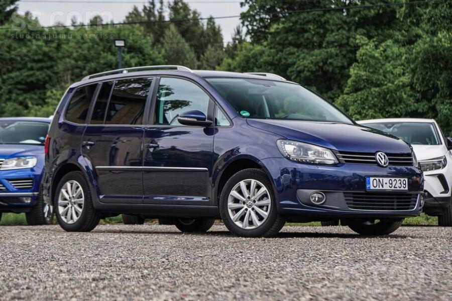 Blue Volkswagen Touran 2012 in Riga, with an engine capacity of 1.40 L and mileage of 227 thousand km for 7990 €, photo 3 on AUTOMOTO.COM.LV