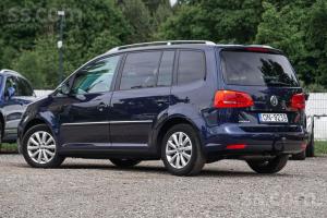 Blue Volkswagen Touran 2012 in Riga, with an engine capacity of 1.40 L and mileage of 227 thousand km for 7990 €, photo 4 on AUTOMOTO.COM.LV