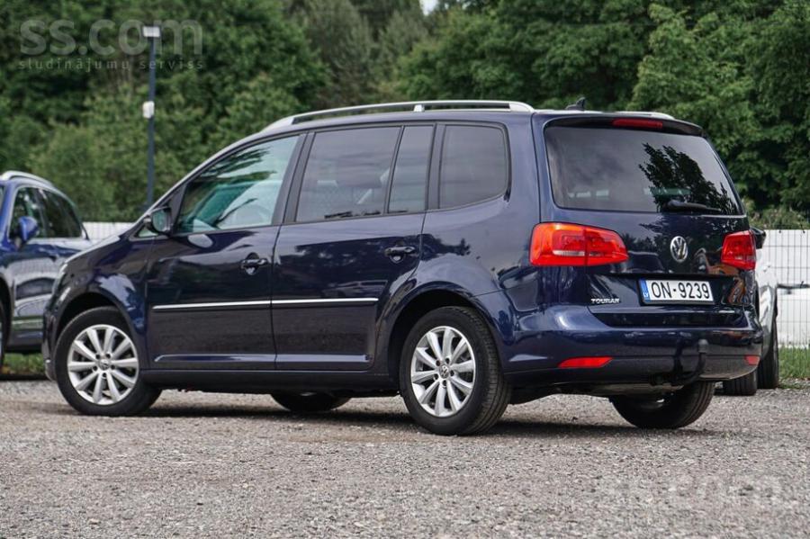 Blue Volkswagen Touran 2012 in Riga, with an engine capacity of 1.40 L and mileage of 227 thousand km for 7990 €, photo 4 on AUTOMOTO.COM.LV