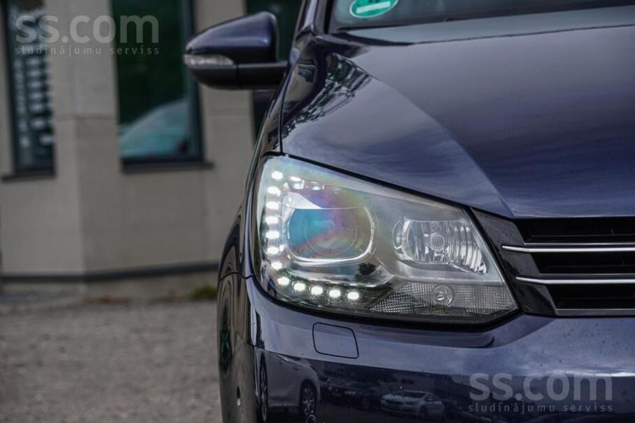 Blue Volkswagen Touran 2012 in Riga, with an engine capacity of 1.40 L and mileage of 227 thousand km for 7990 €, photo 6 on AUTOMOTO.COM.LV
