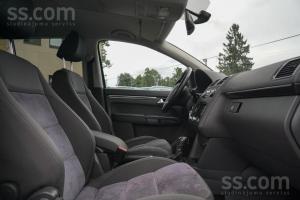 Blue Volkswagen Touran 2012 in Riga, with an engine capacity of 1.40 L and mileage of 227 thousand km for 7990 €, photo 7 on AUTOMOTO.COM.LV