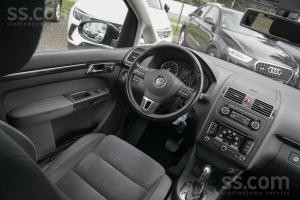 Blue Volkswagen Touran 2012 in Riga, with an engine capacity of 1.40 L and mileage of 227 thousand km for 7990 €, photo 8 on AUTOMOTO.COM.LV