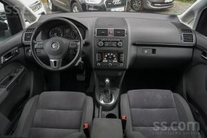 Blue Volkswagen Touran 2012 in Riga, with an engine capacity of 1.40 L and mileage of 227 thousand km for 7990 €, photo 9 on AUTOMOTO.COM.LV