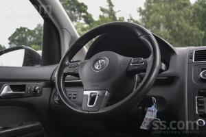 Blue Volkswagen Touran 2012 in Riga, with an engine capacity of 1.40 L and mileage of 227 thousand km for 7990 €, photo 11 on AUTOMOTO.COM.LV