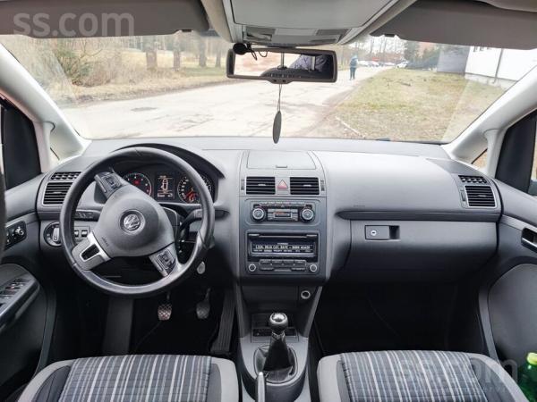 Blue Volkswagen Touran 2012 in Riga, with an engine capacity of 1.40 L and mileage of 332 thousand km for 6700 €, photo 5 on AUTOMOTO.COM.LV