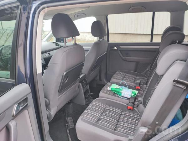Blue Volkswagen Touran 2012 in Riga, with an engine capacity of 1.40 L and mileage of 332 thousand km for 6700 €, photo 7 on AUTOMOTO.COM.LV