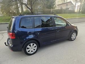 Blue Volkswagen Touran 2012 in Jekabpils, with an engine capacity of 2.00 L and mileage of 313 thousand km for 6890 €, photo 6 on AUTOMOTO.COM.LV