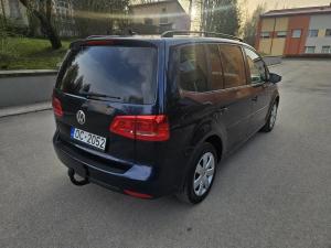 Blue Volkswagen Touran 2012 in Jekabpils, with an engine capacity of 2.00 L and mileage of 313 thousand km for 6890 €, photo 7 on AUTOMOTO.COM.LV