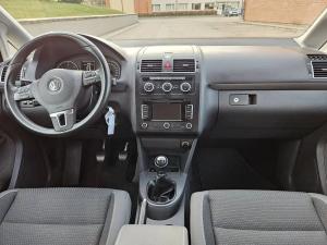 Blue Volkswagen Touran 2012 in Jekabpils, with an engine capacity of 2.00 L and mileage of 313 thousand km for 6890 €, photo 16 on AUTOMOTO.COM.LV