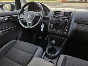 Blue Volkswagen Touran 2012 in Jekabpils, with an engine capacity of 2.00 L and mileage of 313 thousand km for 6890 €, photo 17 on AUTOMOTO.COM.LV