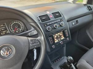Blue Volkswagen Touran 2012 in Jekabpils, with an engine capacity of 2.00 L and mileage of 313 thousand km for 6890 €, photo 22 on AUTOMOTO.COM.LV