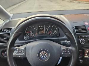 Blue Volkswagen Touran 2012 in Jekabpils, with an engine capacity of 2.00 L and mileage of 313 thousand km for 6890 €, photo 24 on AUTOMOTO.COM.LV