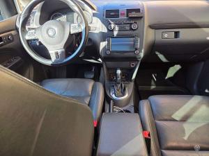 Blue Volkswagen Touran 2012 in Kaunas, with an engine capacity of 1.97 L and mileage of 345 thousand km for 5900 €, photo 11 on AUTOMOTO.COM.LV