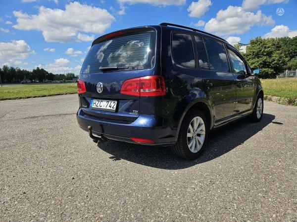 Blue Volkswagen Touran 2012 in Kaunas, with an engine capacity of 1.60 L and mileage of 430 thousand km for 4450 €, photo 4 on AUTOMOTO.COM.LV