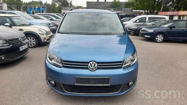 Blue Volkswagen Touran 2012 in Riga, with an engine capacity of 2.00 L and mileage of 0 thousand km for 4950 €, photo 1 on AUTOMOTO.COM.LV