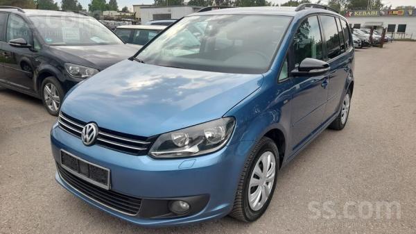 Blue Volkswagen Touran 2012 in Riga, with an engine capacity of 2.00 L and mileage of 0 thousand km for 4950 €, photo 4 on AUTOMOTO.COM.LV