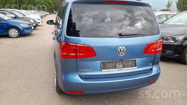 Blue Volkswagen Touran 2012 in Riga, with an engine capacity of 2.00 L and mileage of 0 thousand km for 4950 €, photo 8 on AUTOMOTO.COM.LV