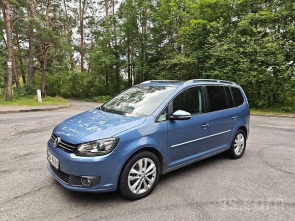 Zils Volkswagen Touran 2012 Rīga, ar dzinēja tilpumu 1.60 L un nobraukumu 211 tūkst. km par 7000 €, foto 1 vietnē AUTOMOTO.COM.LV