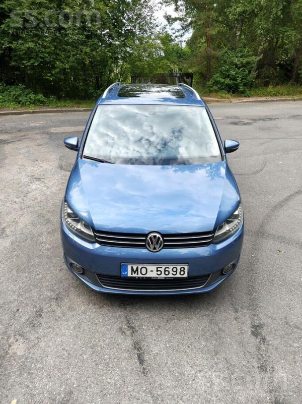 Zils Volkswagen Touran 2012 Rīga, ar dzinēja tilpumu 1.60 L un nobraukumu 211 tūkst. km par 7000 €, foto 8 vietnē AUTOMOTO.COM.LV
