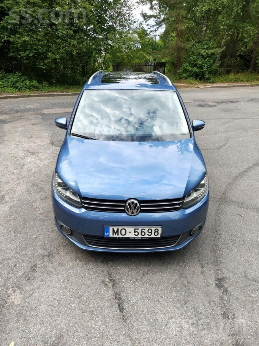 Zils Volkswagen Touran 2012 Rīga, ar dzinēja tilpumu 1.60 L un nobraukumu 211 tūkst. km par 7000 €, foto 9 vietnē AUTOMOTO.COM.LV
