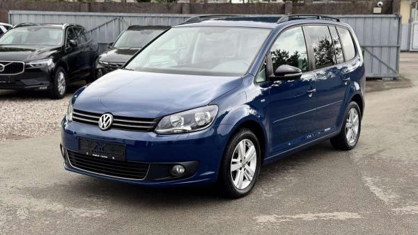 Blue Volkswagen Touran 2012 in Telschi, with an engine capacity of 1.39 L and mileage of 173 thousand km for 6700 €, photo 4 on AUTOMOTO.COM.LV