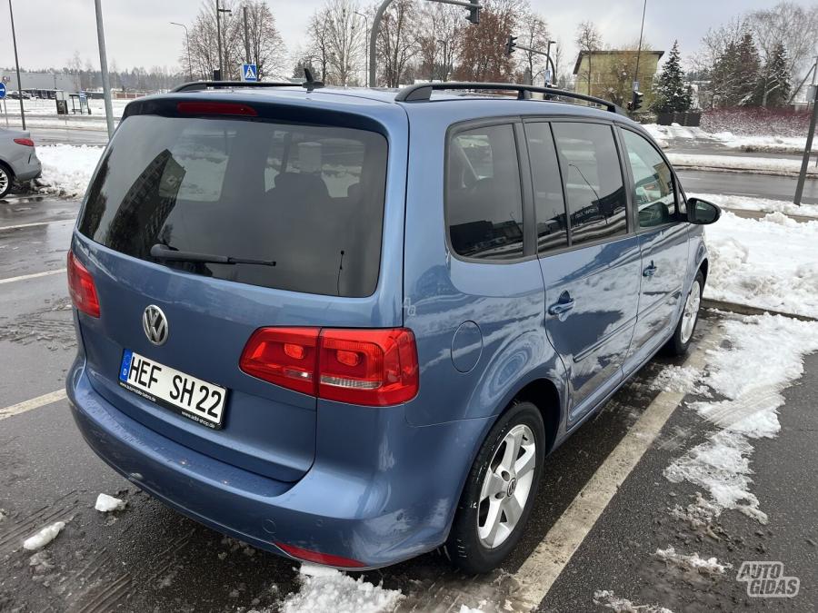 Blue Volkswagen Touran 2013 in Kaunas, with an engine capacity of 1.60 L and mileage of 203 thousand km for 5600 €, photo 4 on AUTOMOTO.COM.LV