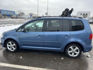 Blue Volkswagen Touran 2013 in Kaunas, with an engine capacity of 1.60 L and mileage of 203 thousand km for 5600 €, photo 5 on AUTOMOTO.COM.LV