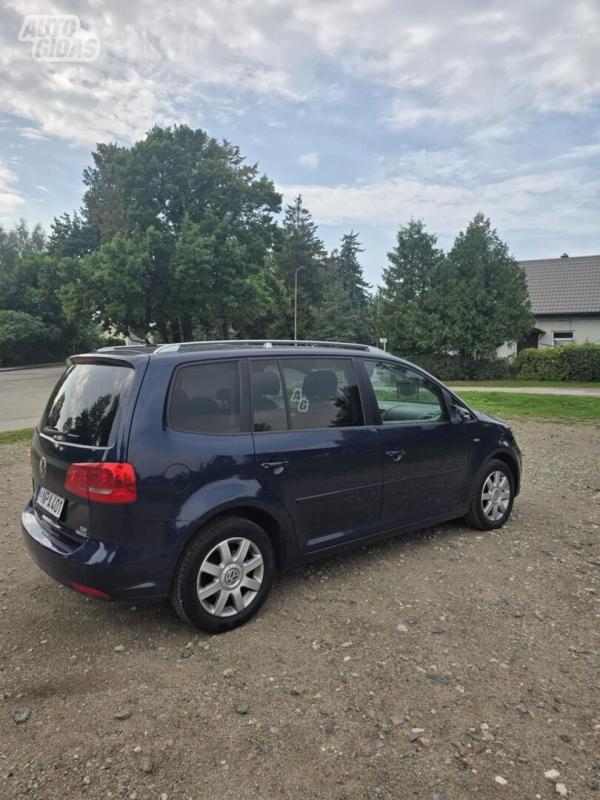 Blue Volkswagen Touran 2013 in Panevezys, with an engine capacity of 1.60 L and mileage of 284 thousand km for 5800 €, photo 3 on AUTOMOTO.COM.LV